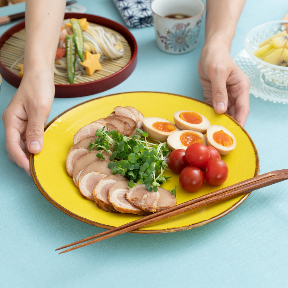 Changing seasons with yellow plates and bowls from MERU’s Flamenco Ser